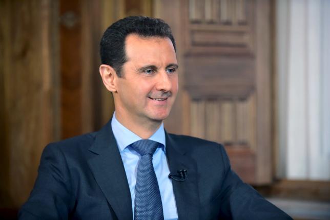 U.S. says Assad must go, timing down to negotiation