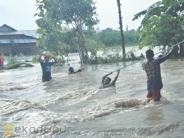 Flash flood sweeps away under construction bridge