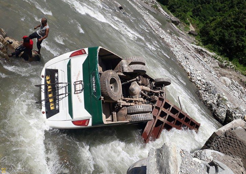 Bus falls into stream as bridge caves in, two dead