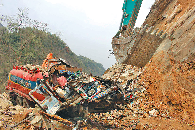 Two killed as falling rocks hit four highway vehicles