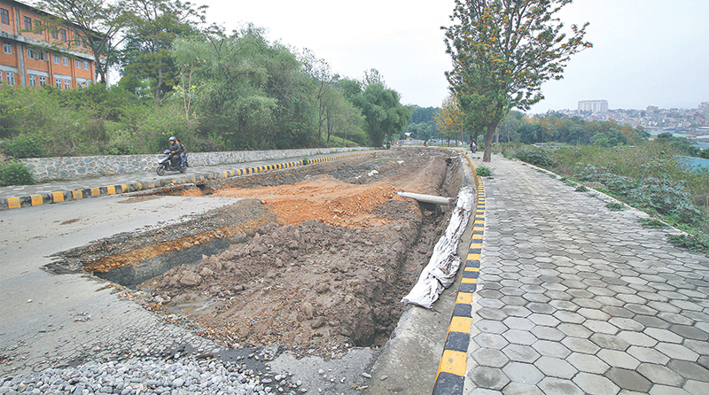 Capital road in dire condition (In photos )