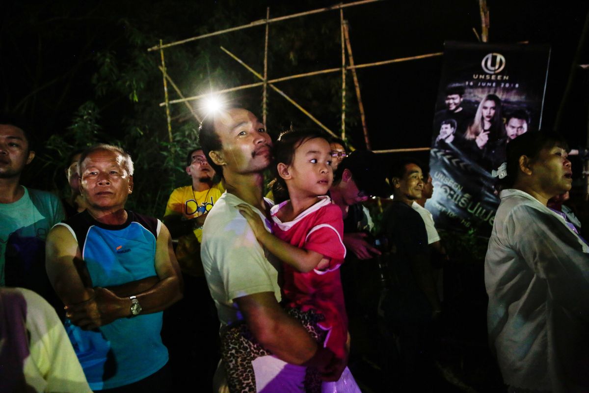 All 13 rescued from flooded Thai cave: navy SEAL unit