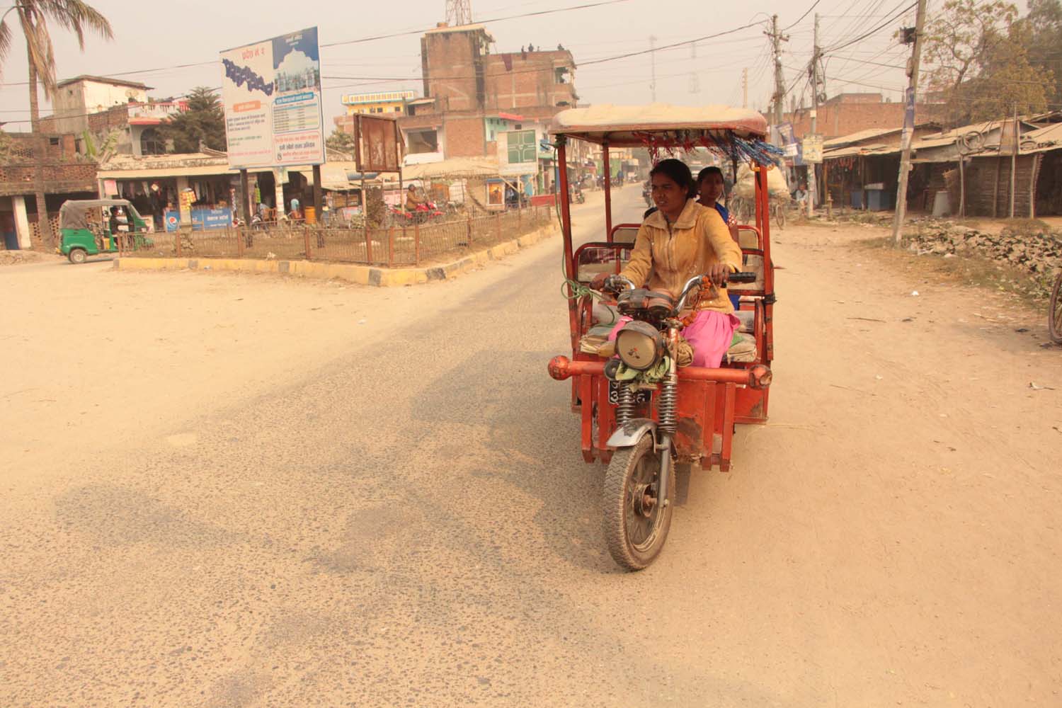 Madhesi woman drives auto rickshaw for livelihood in Janakpur