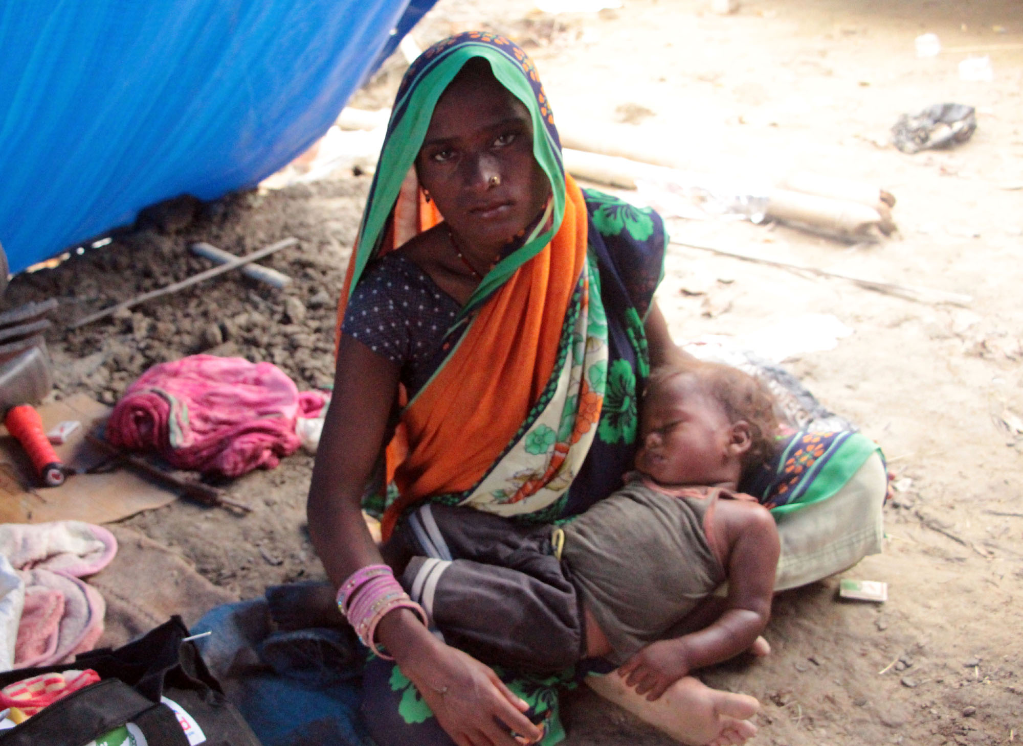 Over 200 flood-displaced families under flimsy huts in biting cold in ...