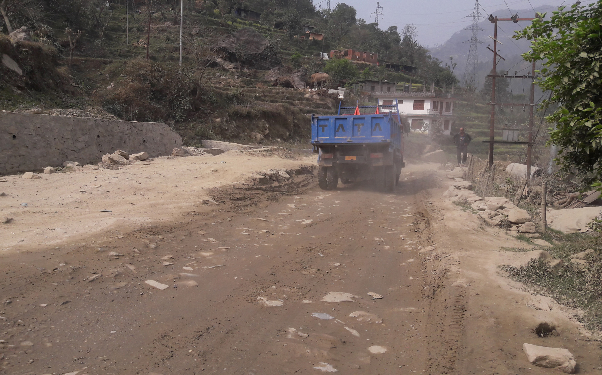 Road upgradation work halted citing insecurity, no payment
