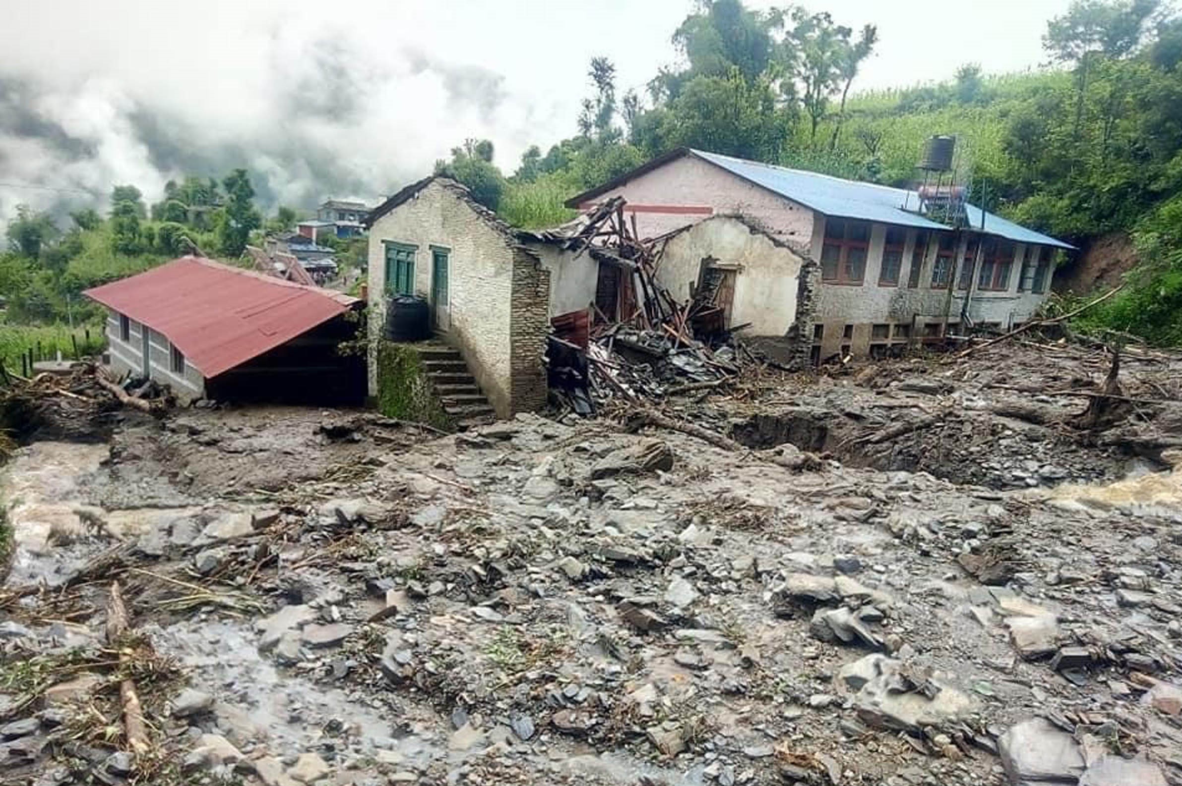 Thirteen dead and dozens missing as heavy rains trigger landslides ...