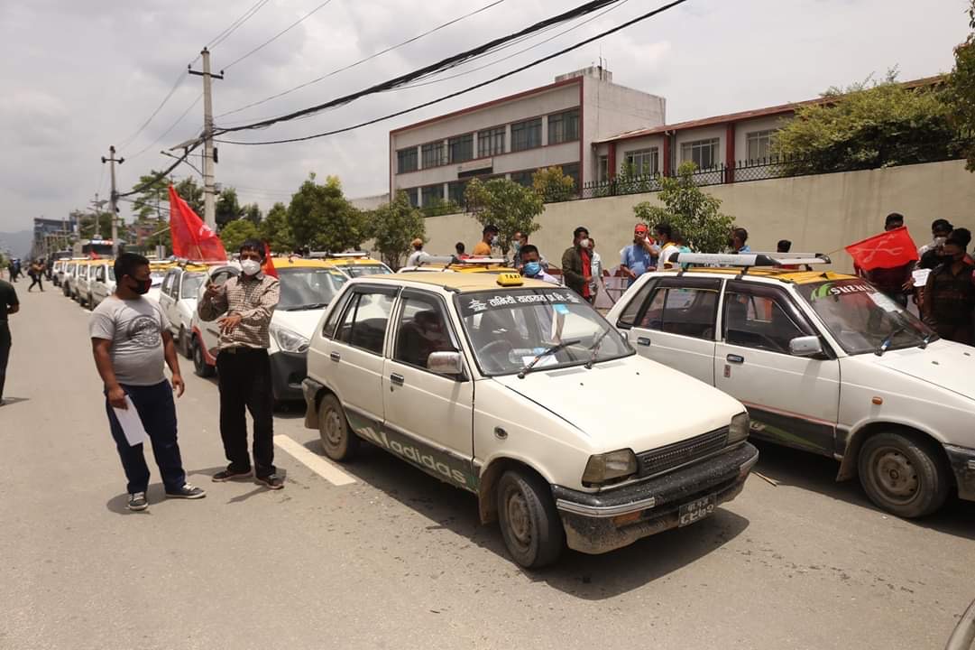Taxi drivers protest outside transport department, accuse officials of ...