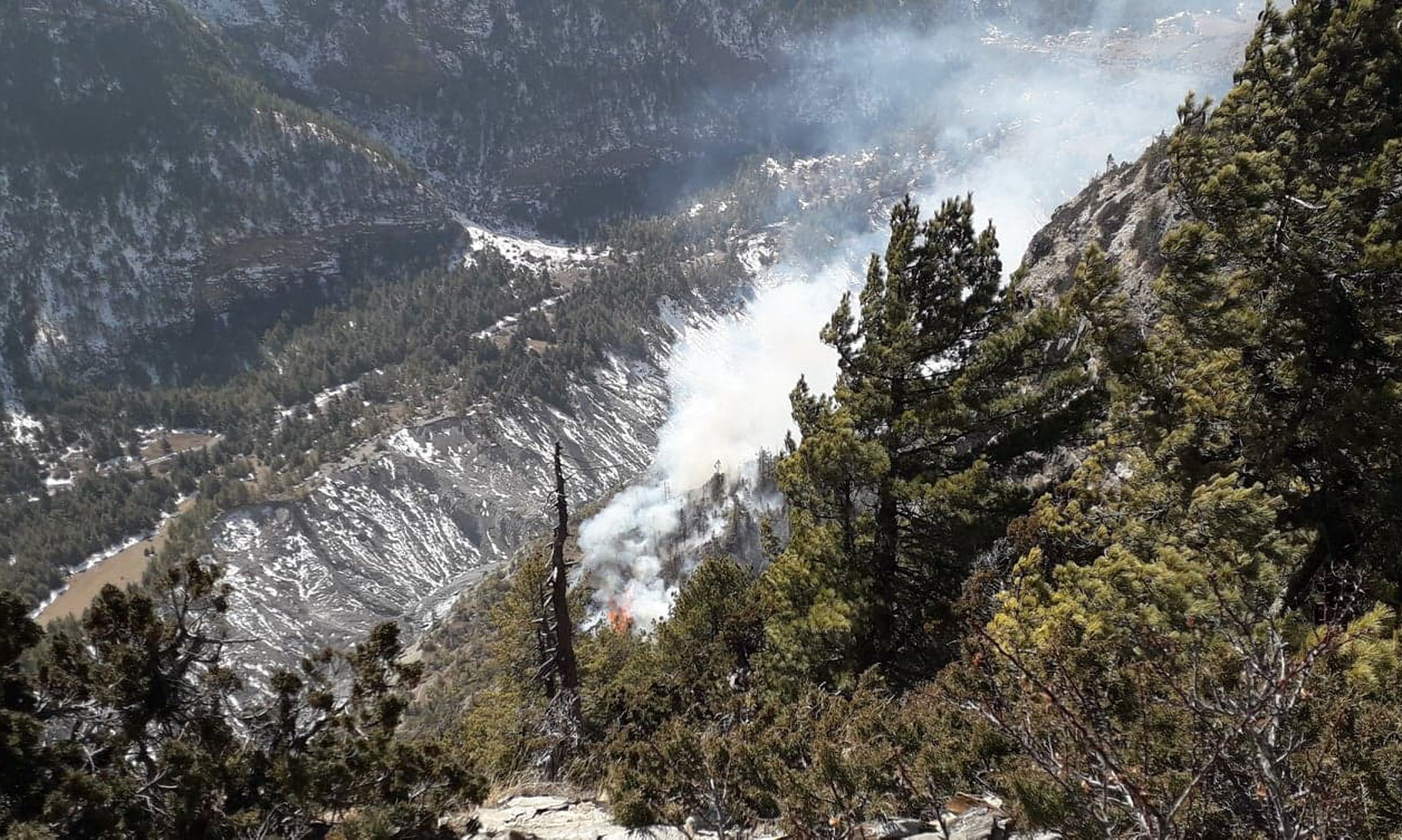 Wildfire raging in the forests of Manang district