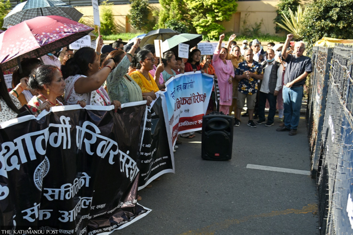 Victims protest planned changes to transitional justice law