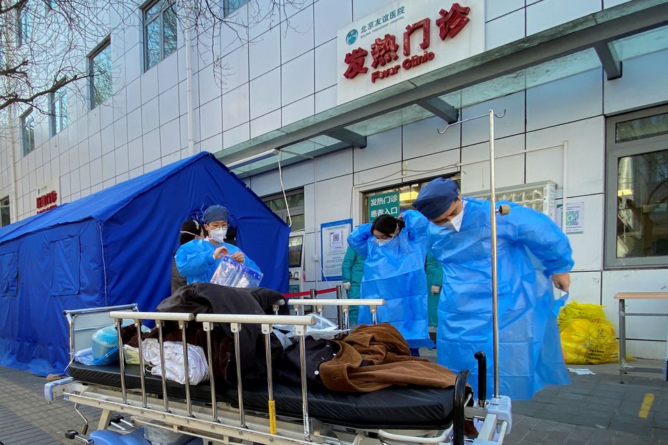 China’s stretched health system braces for peak in COVID infections