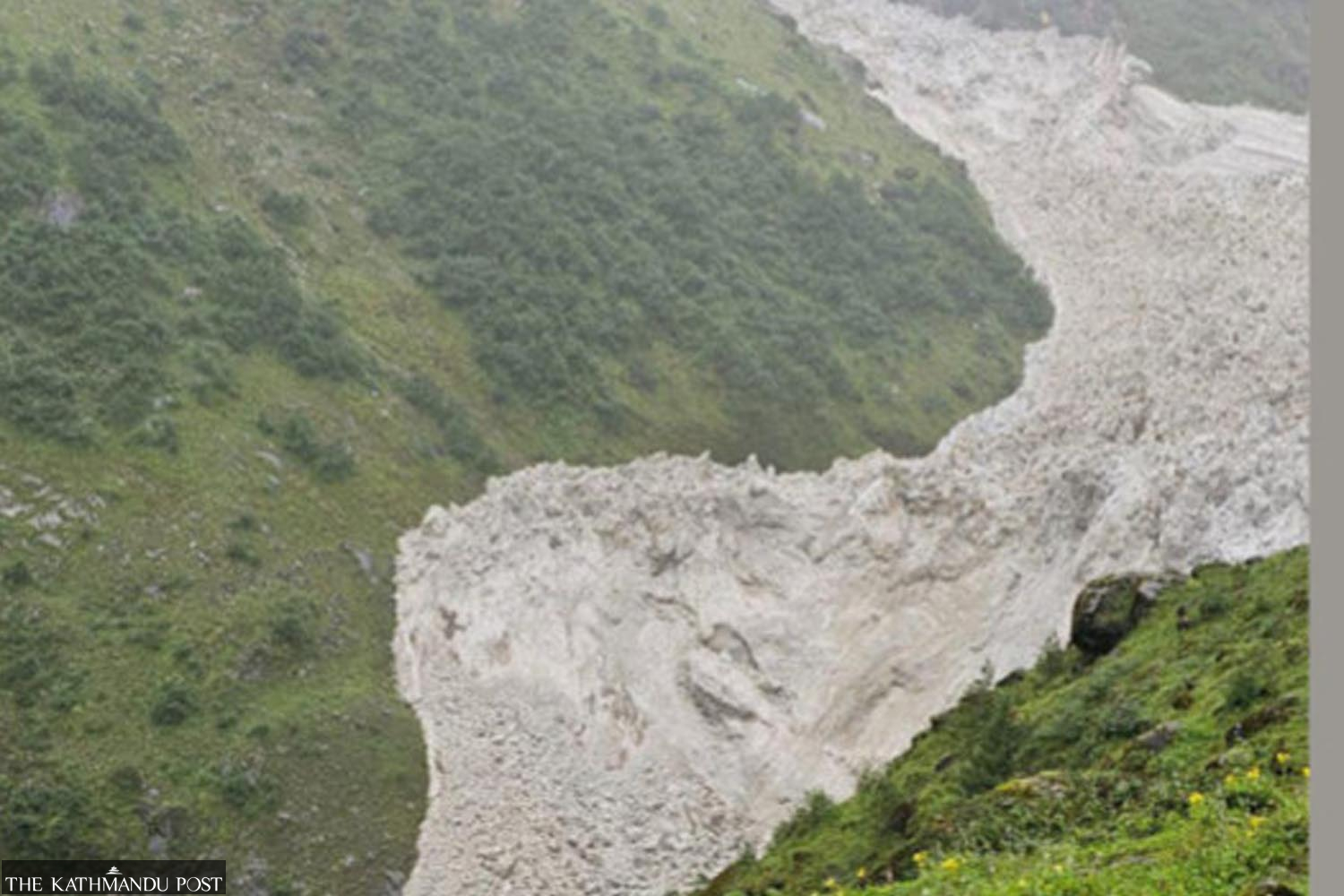 Avalanche blocks river in Mustang