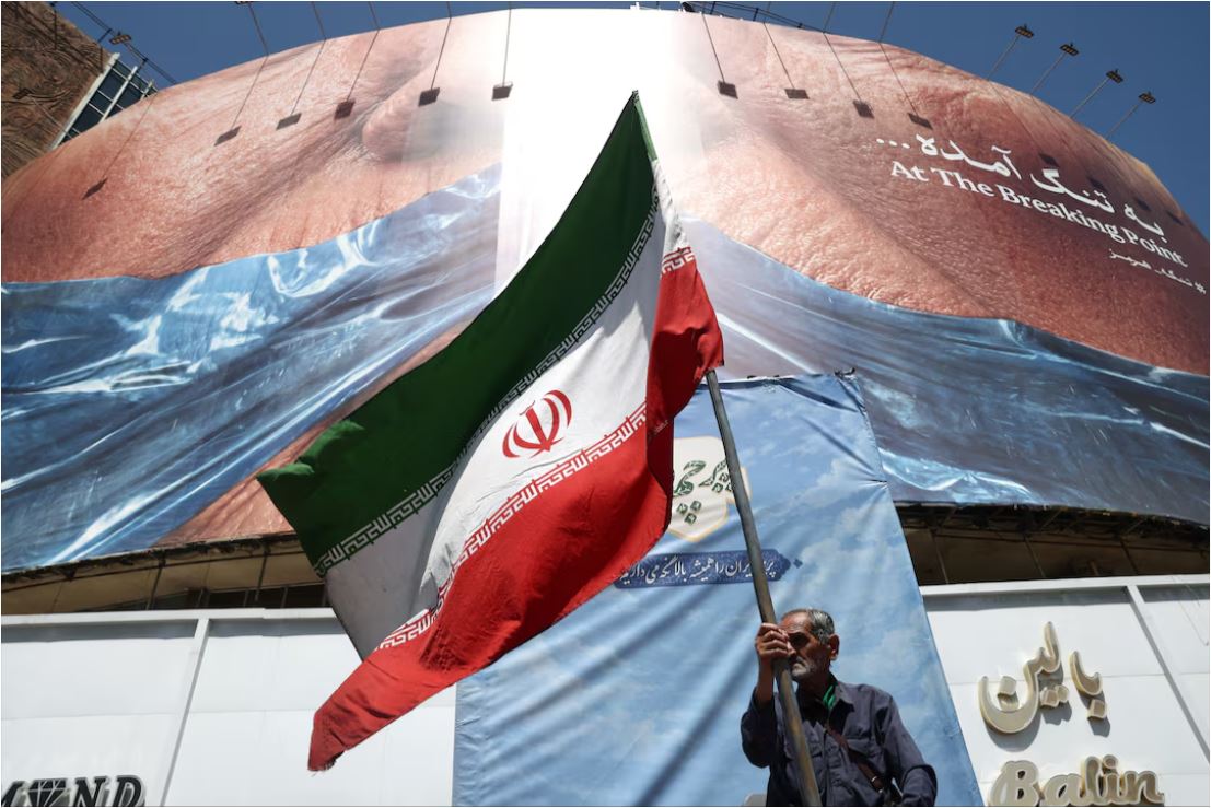 US says it struck Iranian military sites, Tehran responds with air base ...